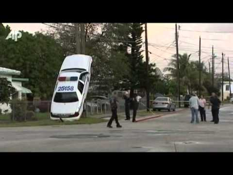 Crash Leaves Police Cruiser Up Light Pole | Officer