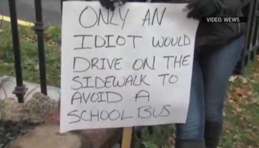 Ohio Woman Who Drove on Sidewalk Holds 'Idiot' Sign | Officer