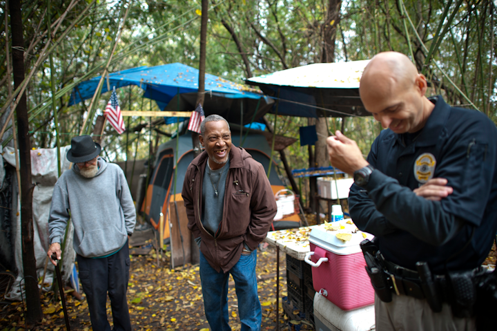 Photos: Georgia Officer Patrols Homeless Camps | Officer