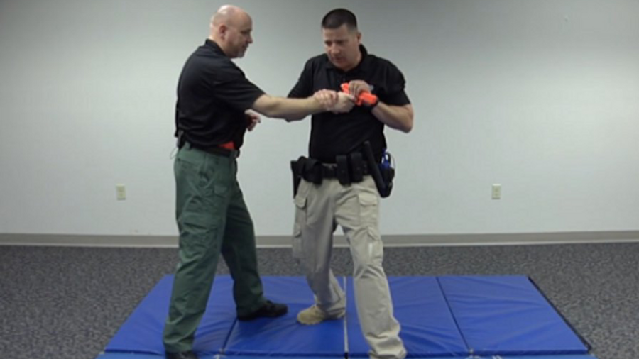 Rear Wrist Lock & Twist Lock: Defensive Tactics | Officer