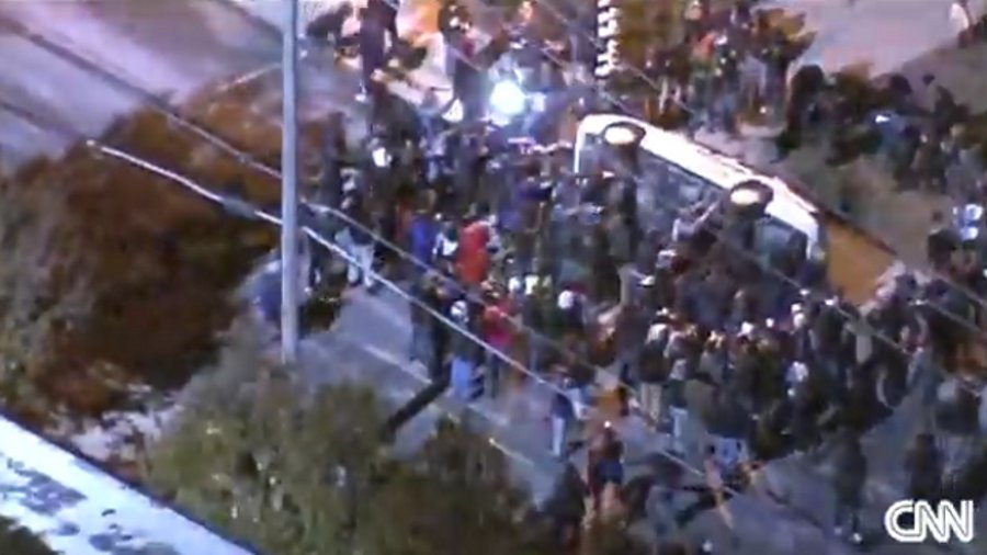 Ferguson Protesters Flip Police Car Outside City Hall | Officer