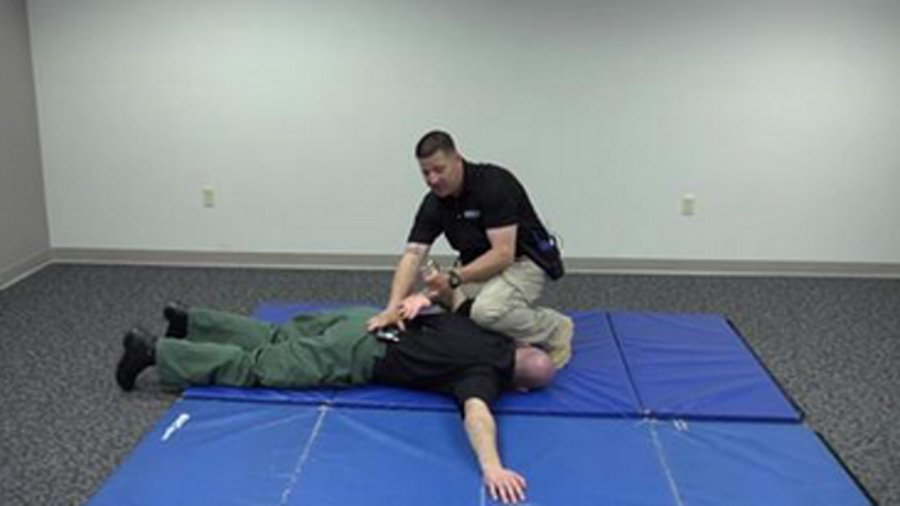 Prone Handcuffing and Search: Defensive Tactics | Officer