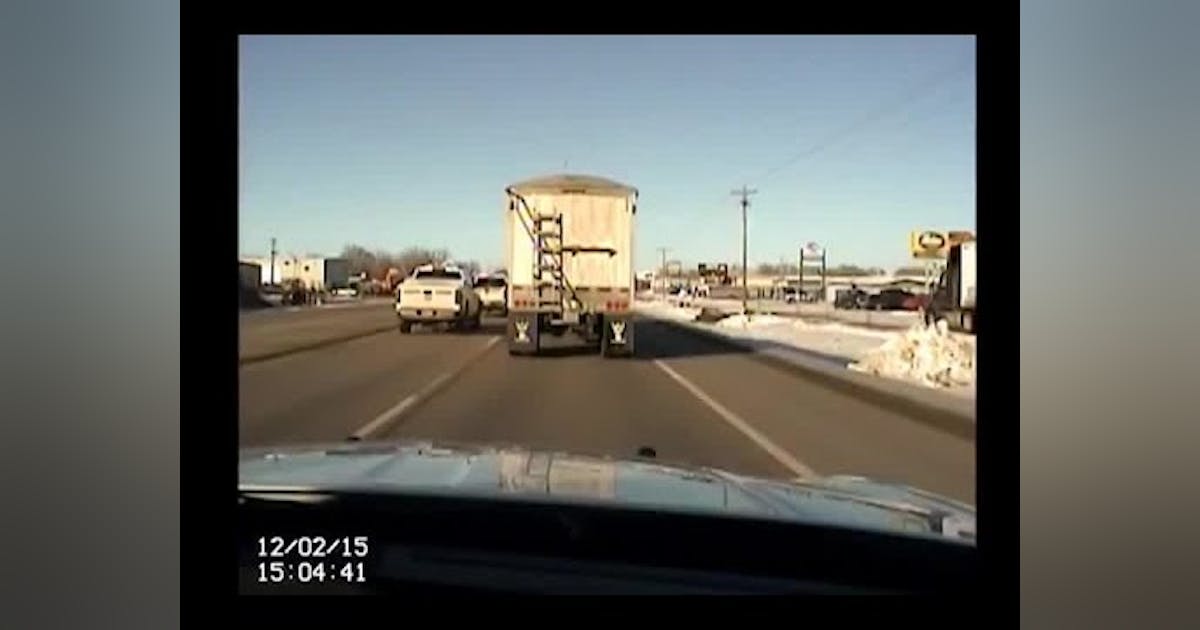 Nebraska Deputy Jumps Onto Moving Tractor Trailer Officer