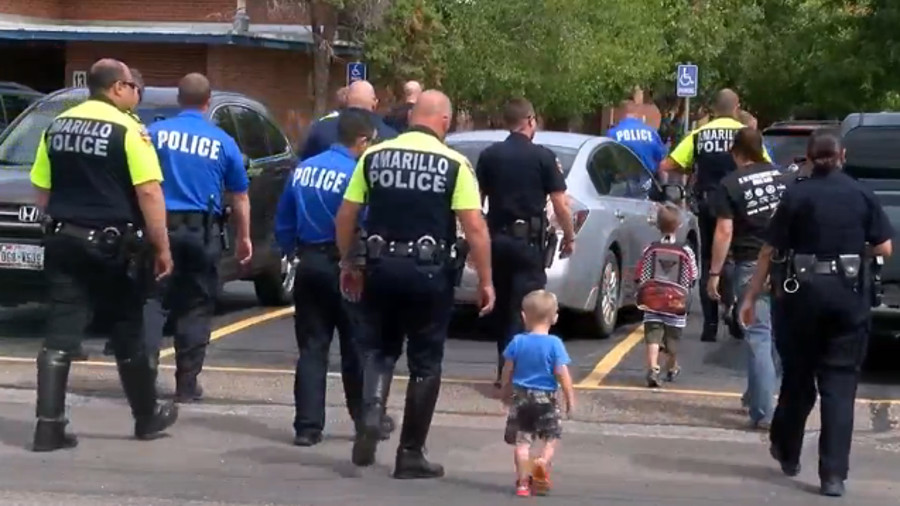 Kids of Fallen Officer Surprised With Police Escort on First Day of ...
