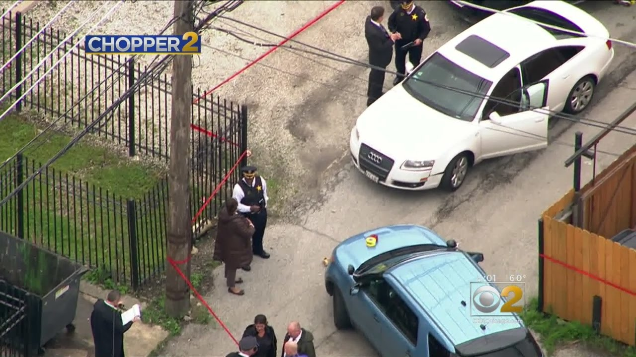 Chicago Police Shoot Suspect After Officer Pinned By Vehicle | Officer