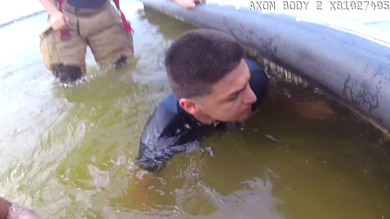 Officer's Body Camera Footage Shows Rescue of Young Boy Trapped Under ...