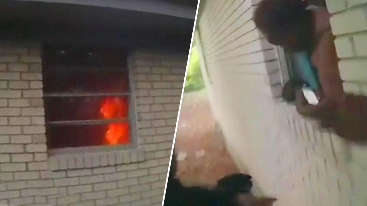 Georgia Police Officers Pull Woman From Window of Burning House | Officer