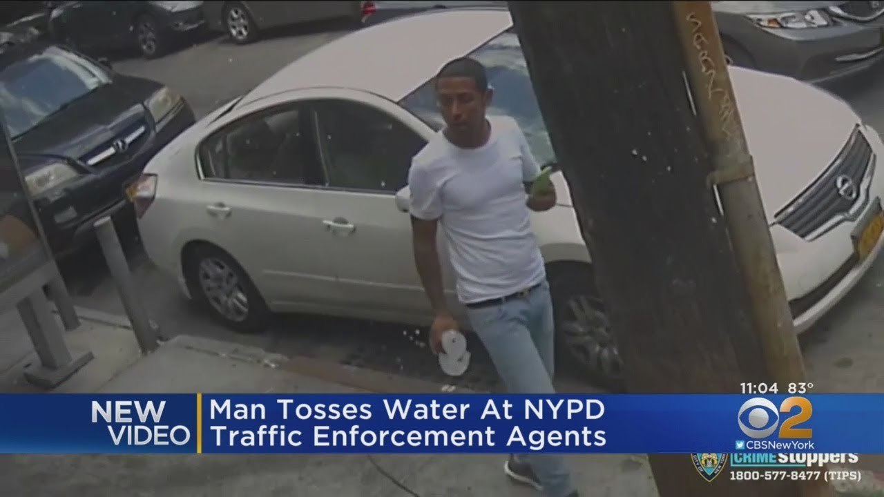 Video Shows Man Throwing Water at NYPD Officers | Officer