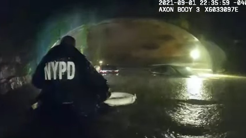 Watch NYPD Save Stranded Livery Driver from Flooding | Officer