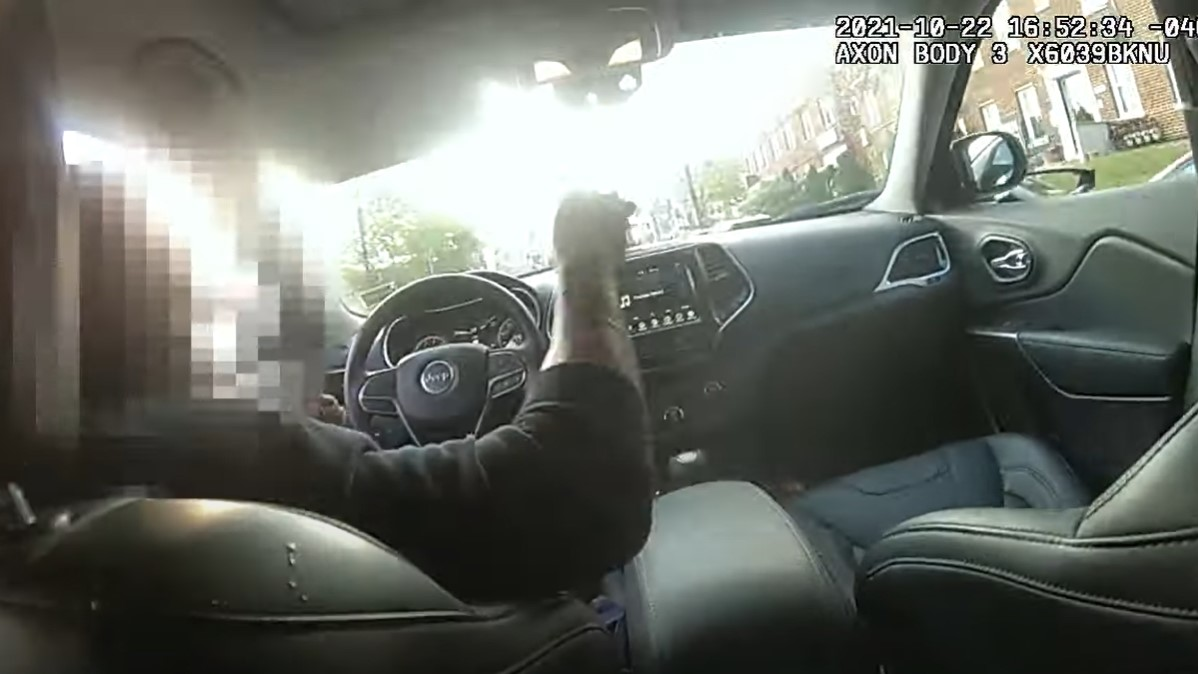 Watch D.C. Police Officer's Harrowing Escape from Moving SUV | Officer