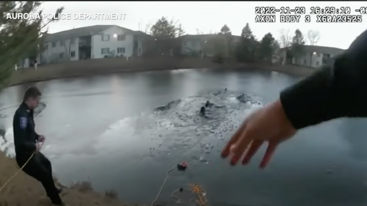 Watch Ill. Police Rescue Boy, Woman from Frigid Pond | Officer
