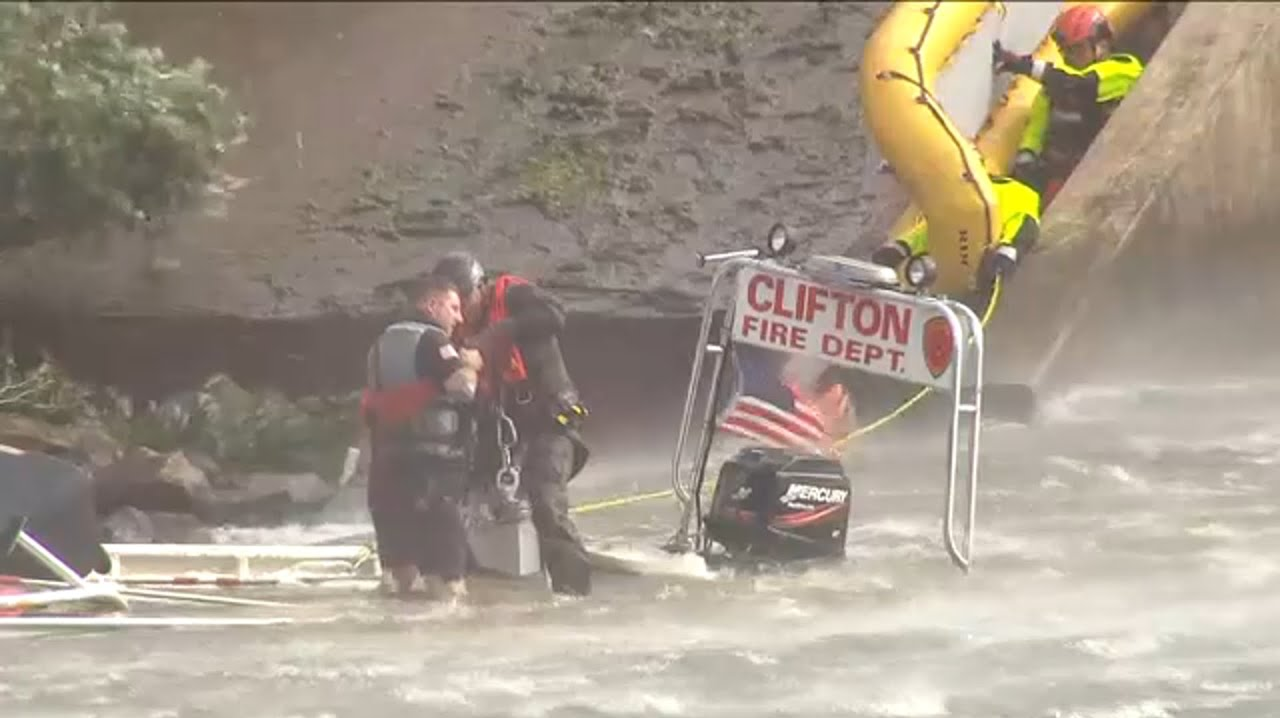 Watch N.J. State Police Rescue 2 Stranded Firefighters from Raging ...