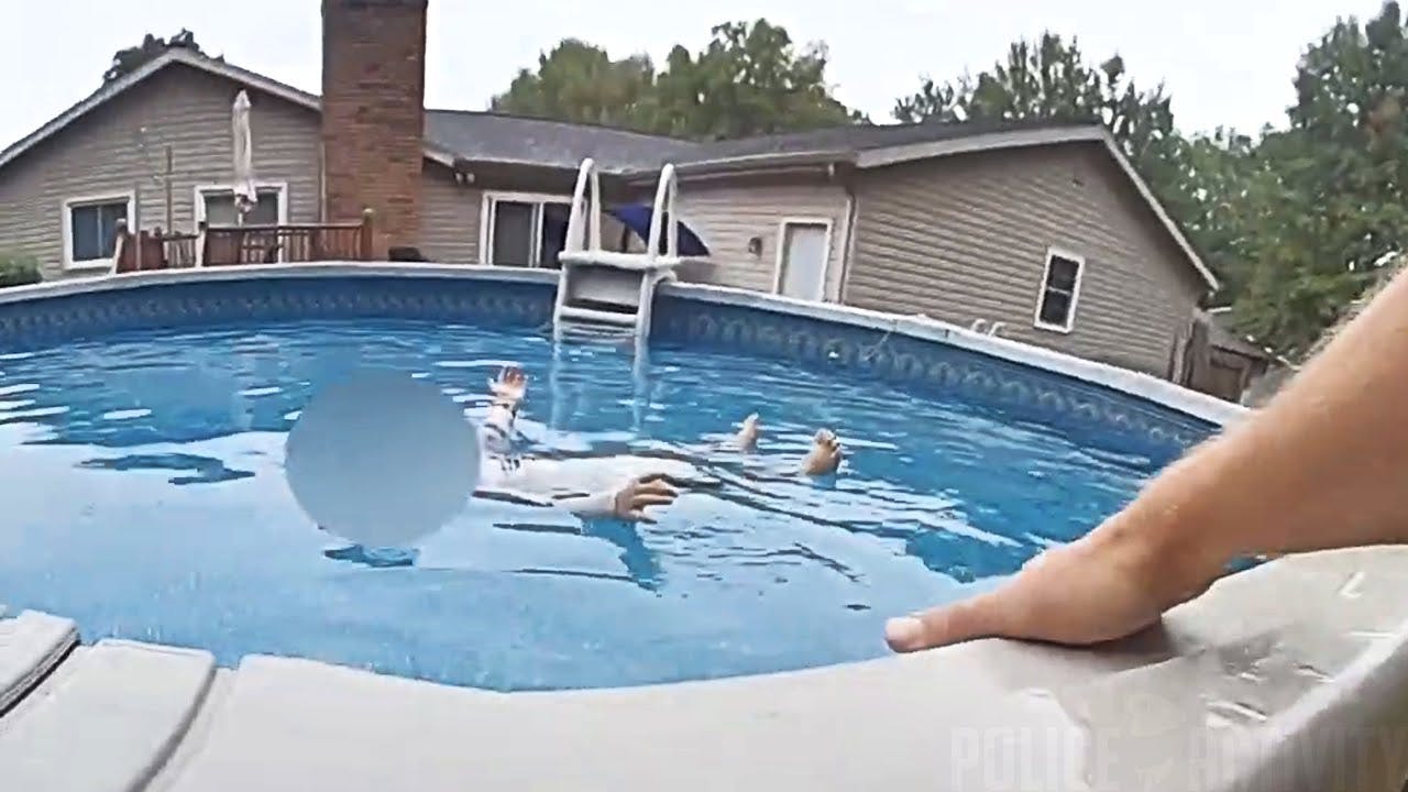 Watch Ind. Police Officer Save Autistic Boy Floating in Swimming Pool ...